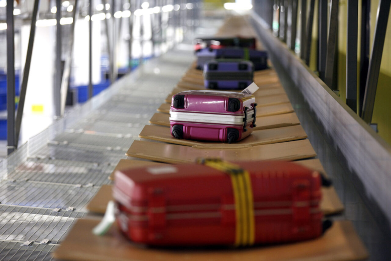 Tilt-Tray Loop Sortation System for Airport Baggage